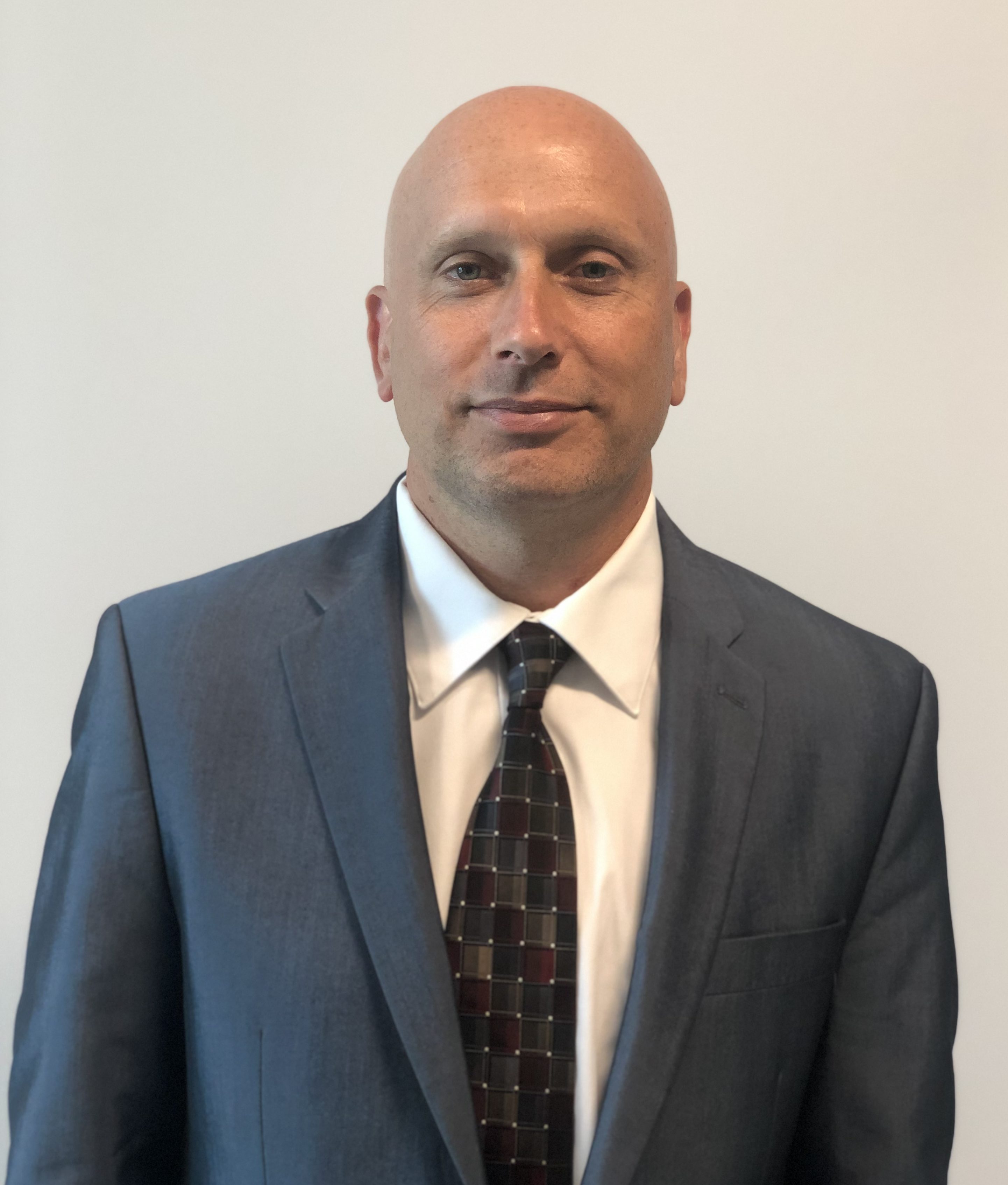 John Hooley - The MIL Corporation